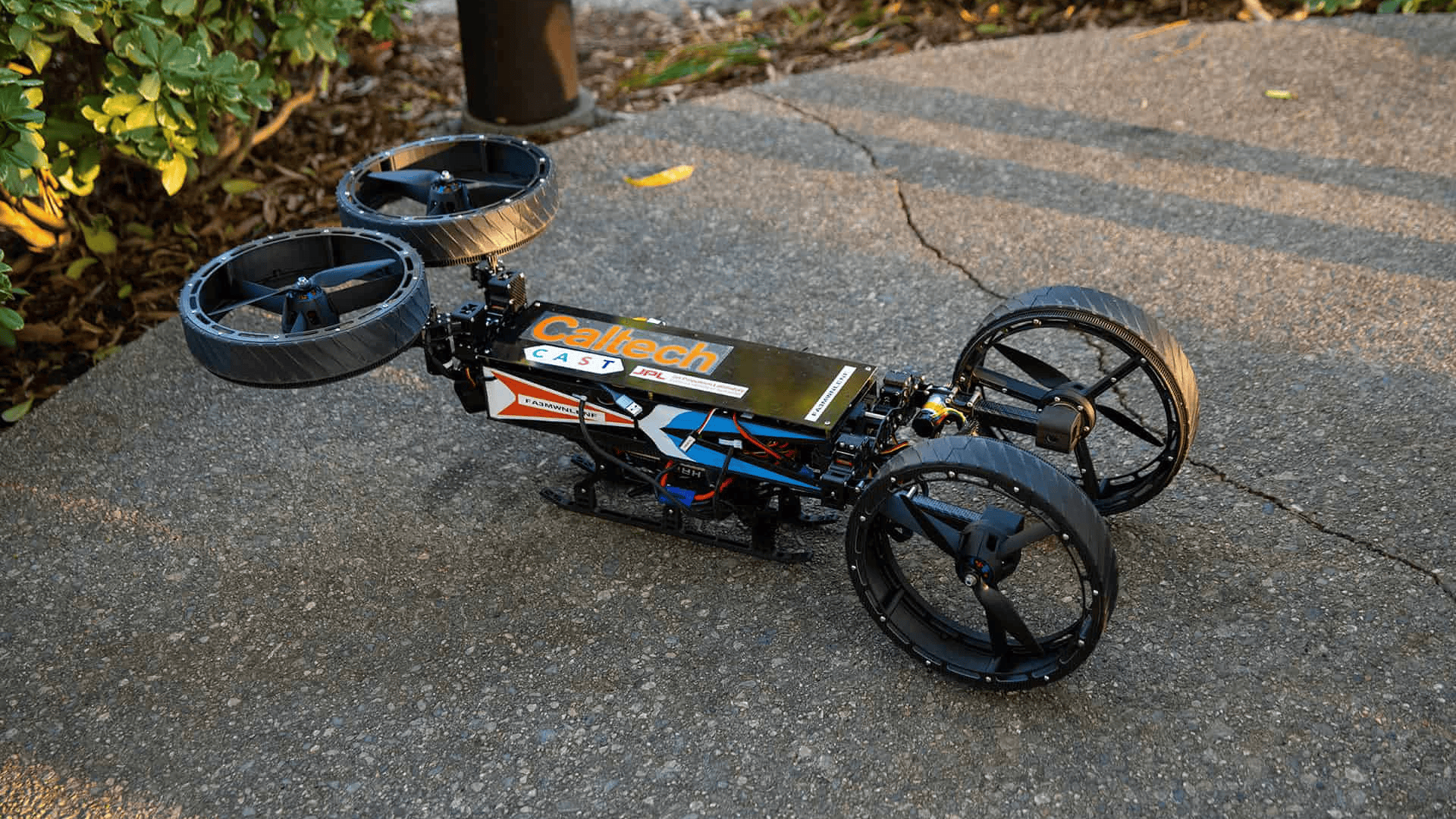 Transformer drone, with wheels, is able to fly and walk